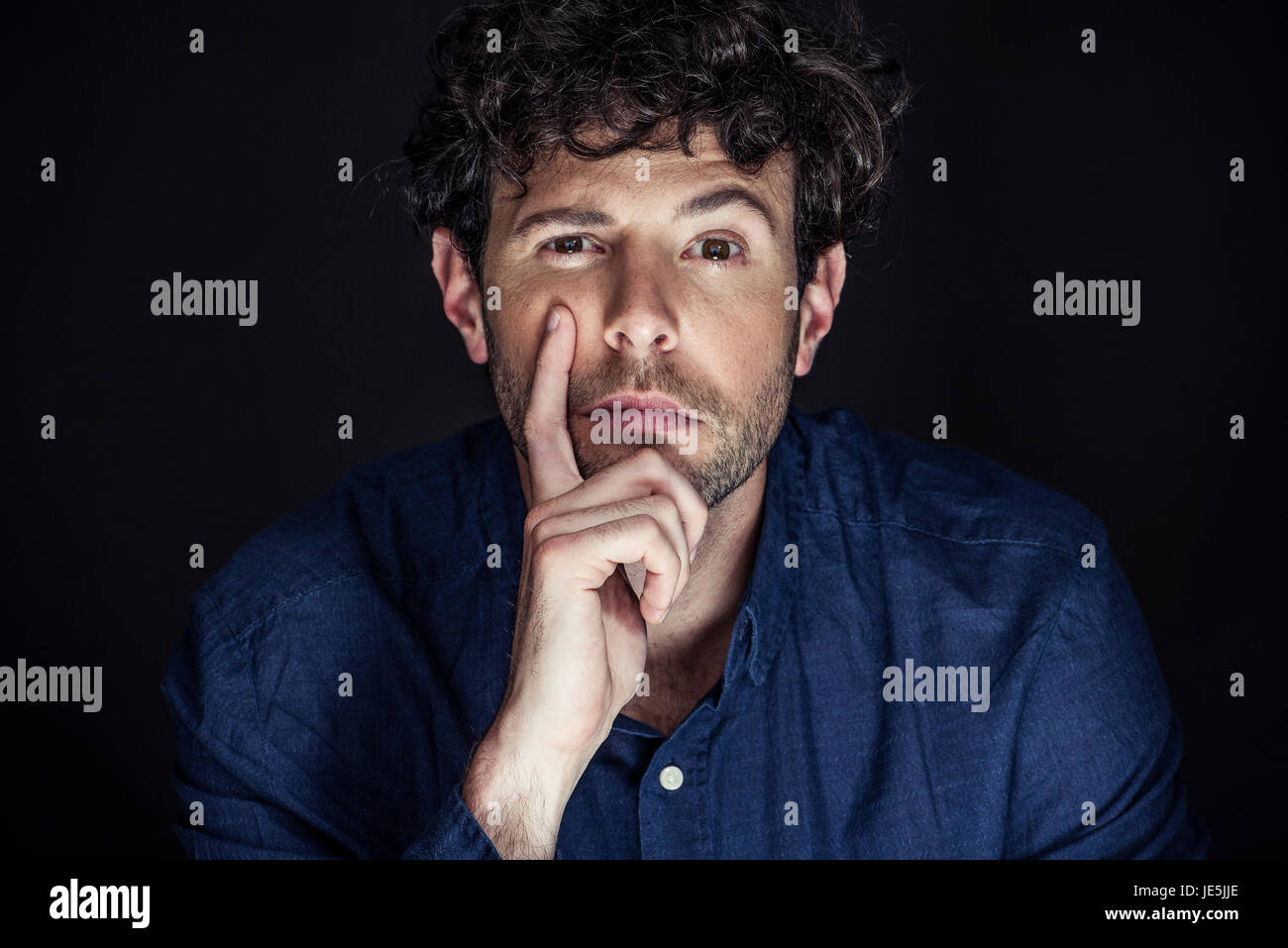 Raising eyebrows hi-res stock photography and images - Alamy