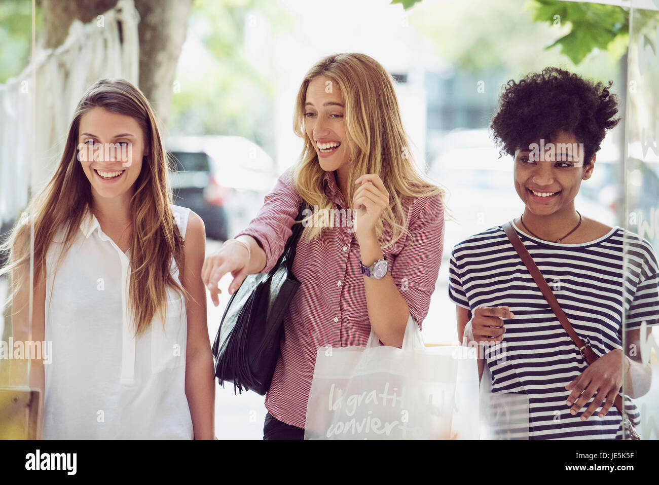 Friends shopping together Stock Photo - Alamy