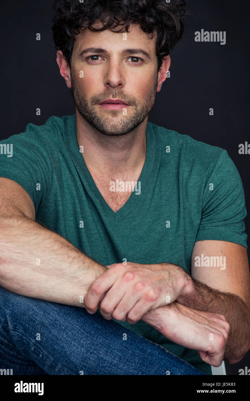 Resting on knee hi-res stock photography and images - Alamy