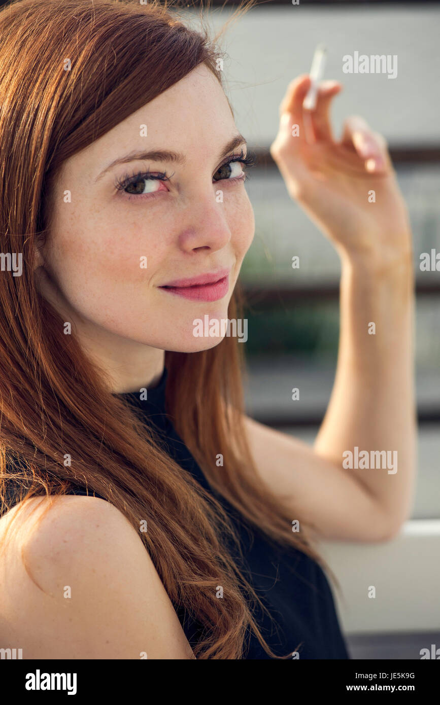 Woman smoking, portrait Stock Photo - Alamy
