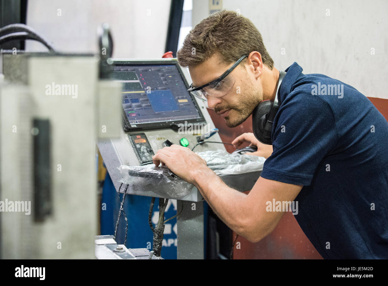 Factory workers machining hi-res stock photography and images - Alamy
