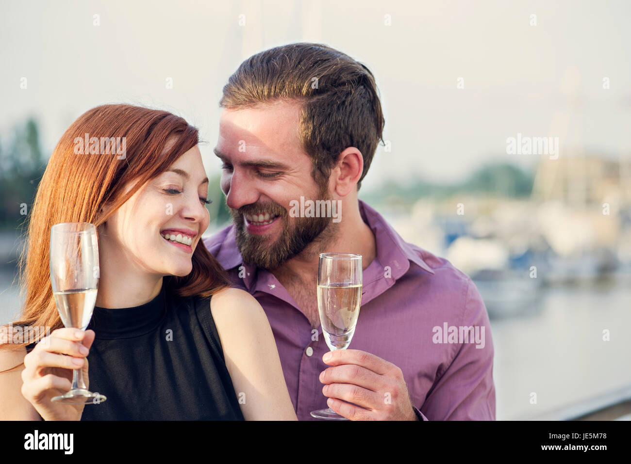 Couple drinking champagne together Stock Photo - Alamy