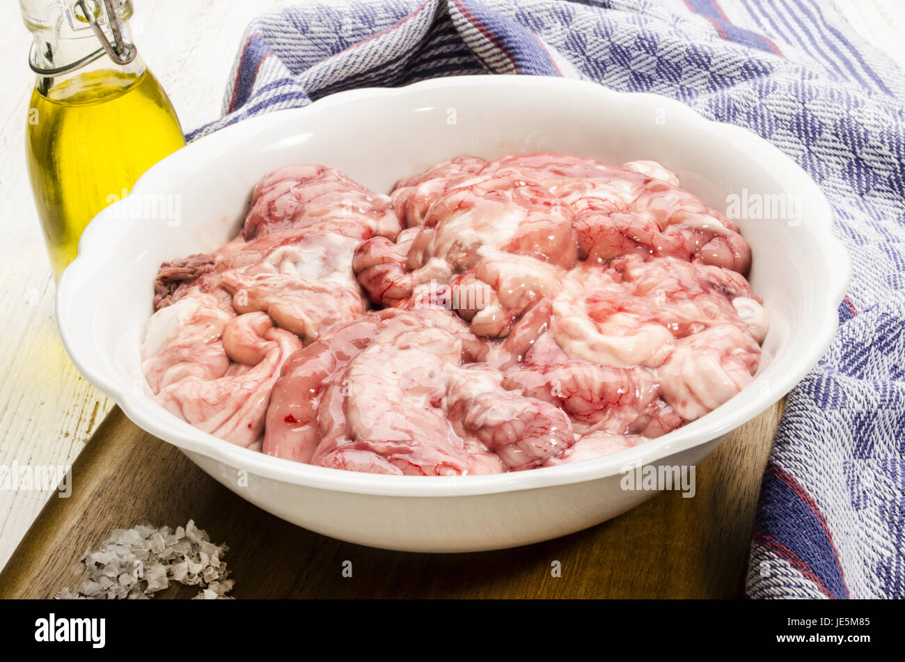 raw pig brain in a white bowl, fresh from the butcher Stock Photo - Alamy