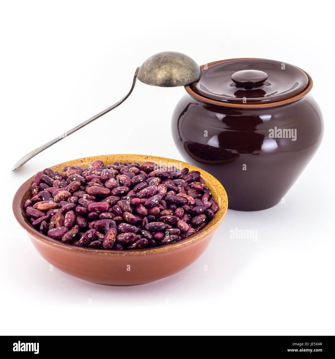 Still life of Red beans in ceramic pial, ceramic pot, old spoon ...