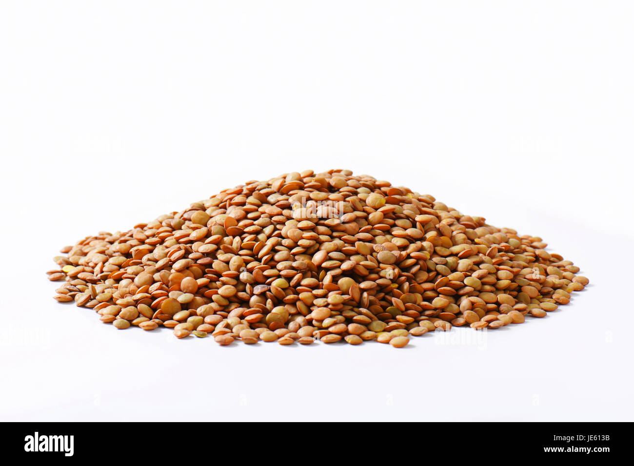 Pile of dried brown lentils Stock Photo - Alamy