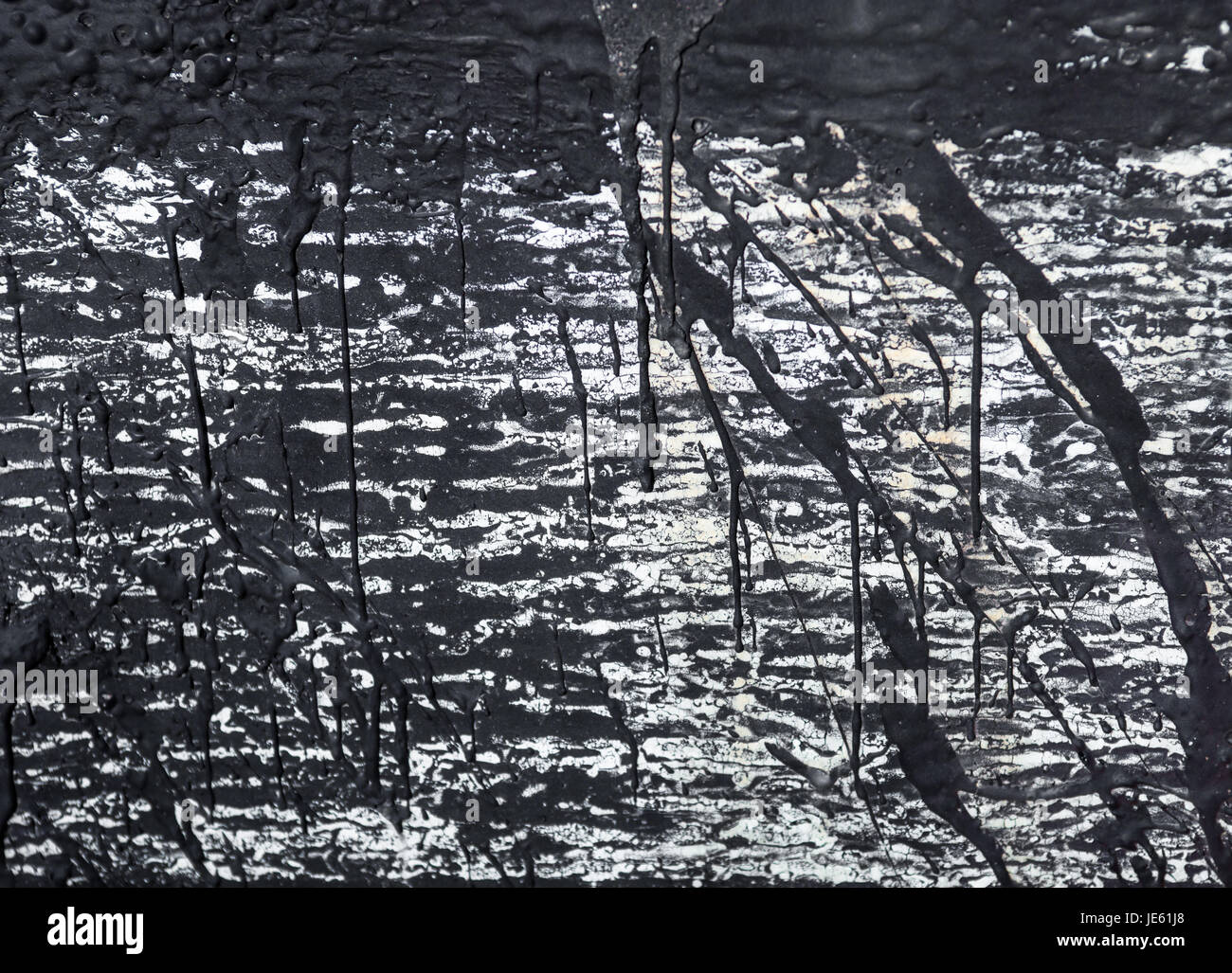 The surface with the streaks of black tar Stock Photo - Alamy