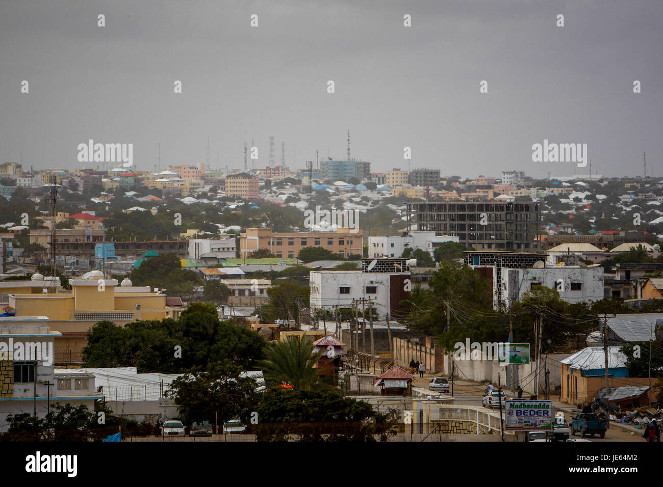 The image captures daily life in Mogadishu, Somalia, highlighting the ...