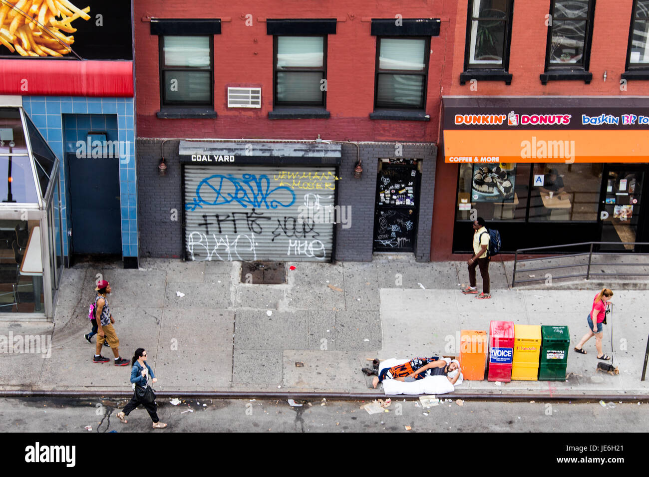Homeless man sleeping in the East Village, Manhattan, New York City ...