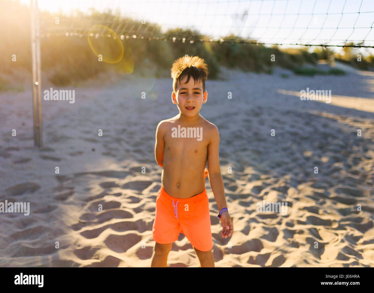 boy playing on the beach Stock Photo - Alamy