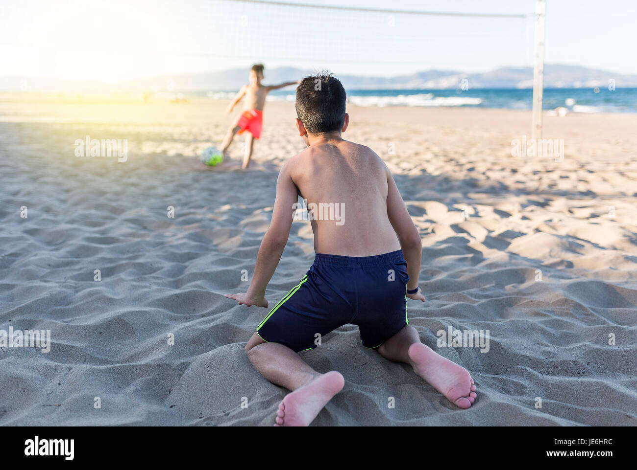 boy playing on the beach Stock Photo - Alamy
