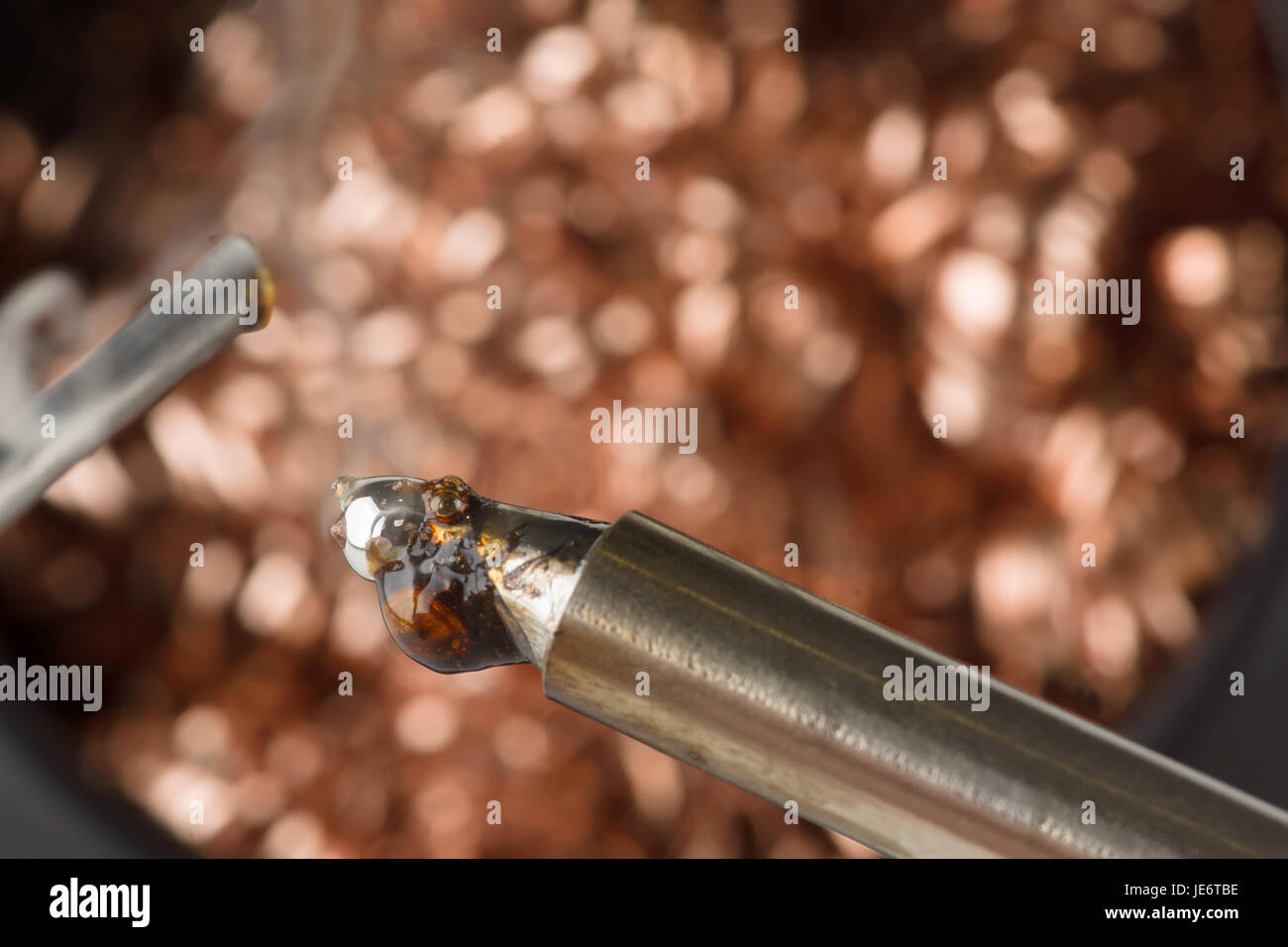Metal chips in the tank is used to clean the soldering iron from the ...
