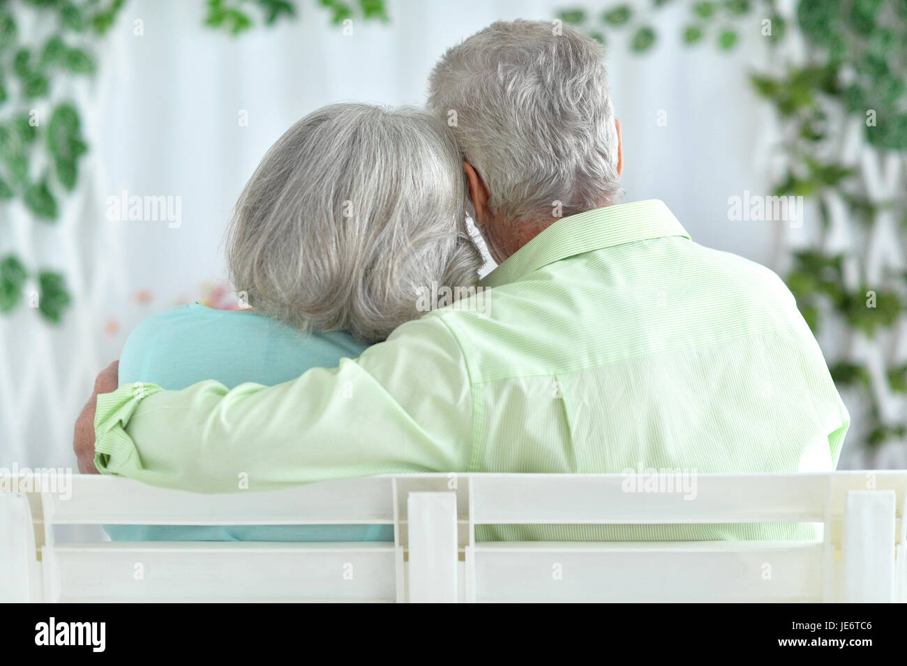 Older people hug rear view hi-res stock photography and images - Alamy