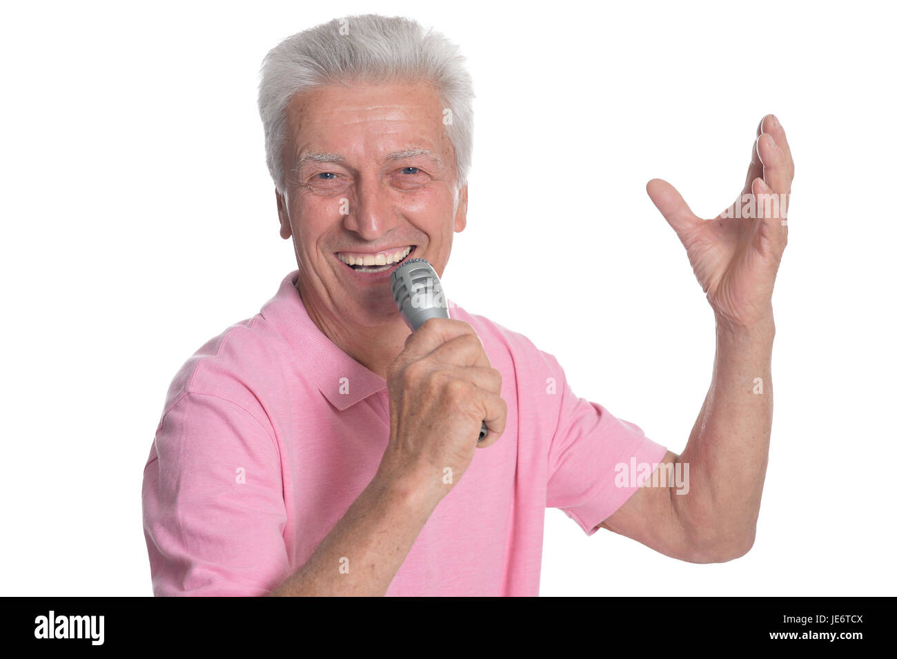 senior man singing karaoke Stock Photo - Alamy