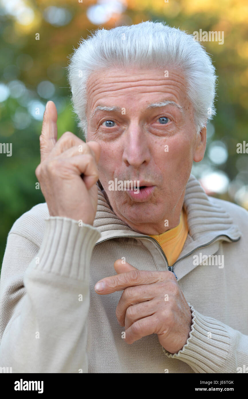 elderly man pointing up Stock Photo - Alamy
