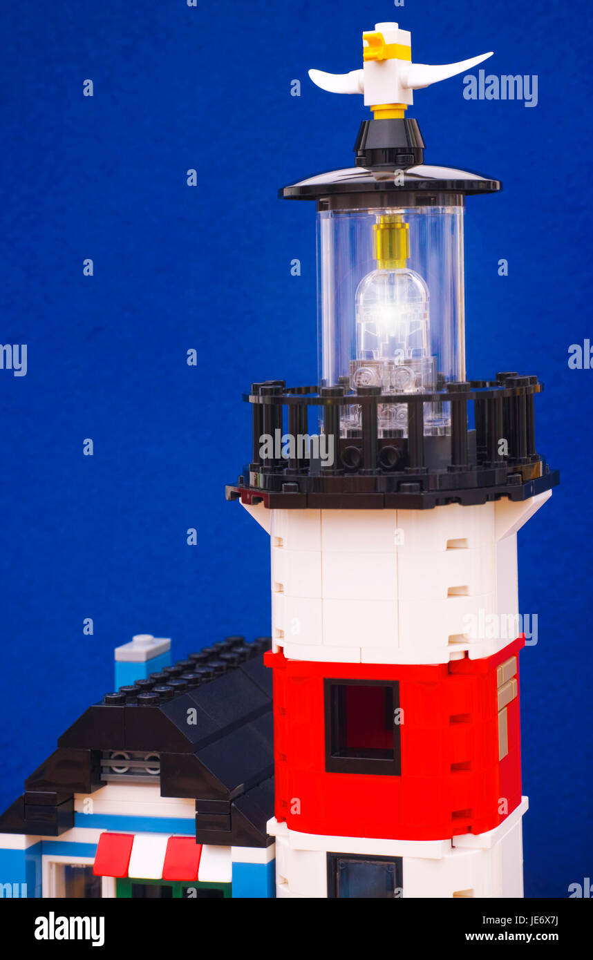 Tambov, Russian Federation - June 15, 2017 Lego Lighthouse on blue ...