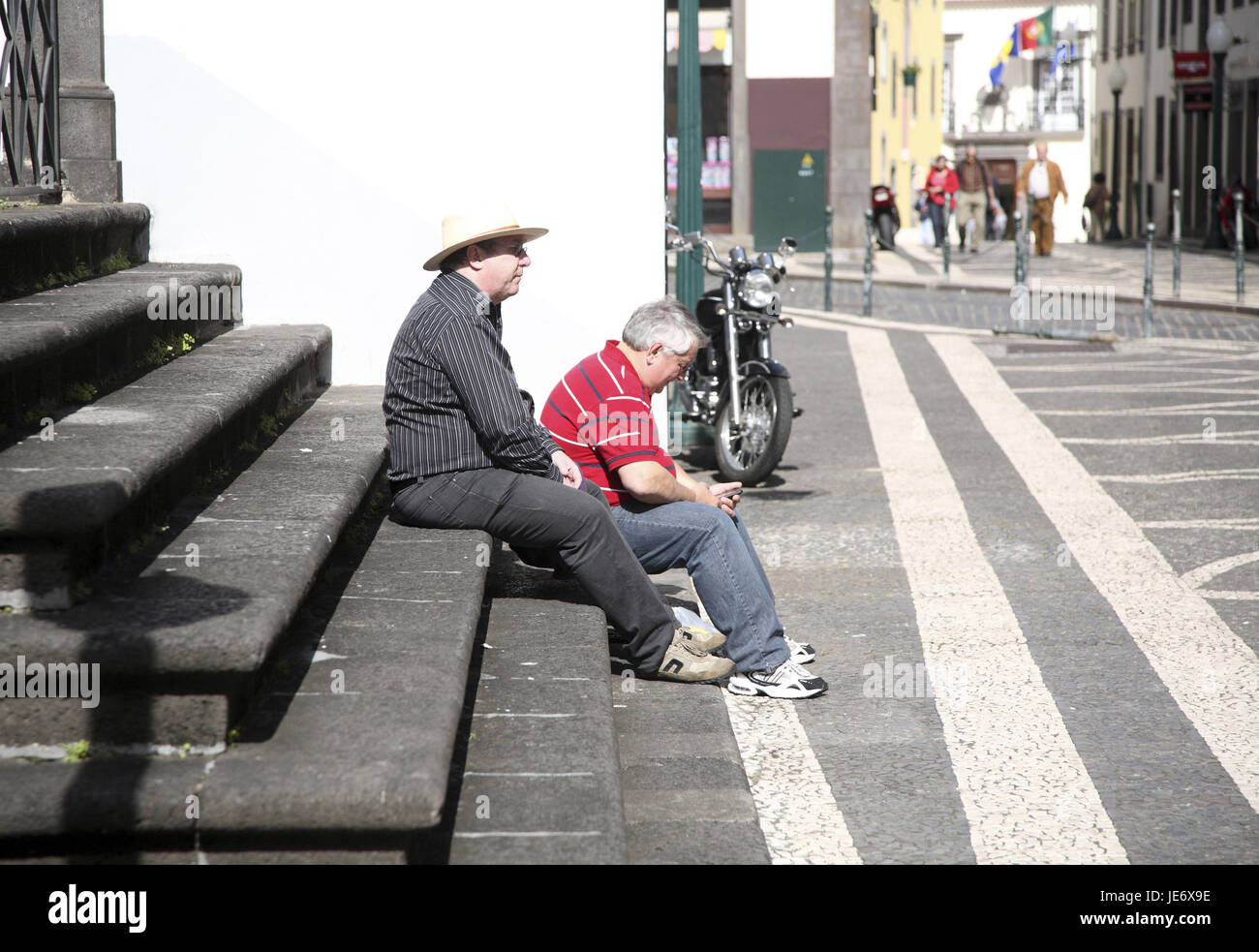 Portugal, Madeira, Funchal, two men sit on stairs Stock Photo - Alamy