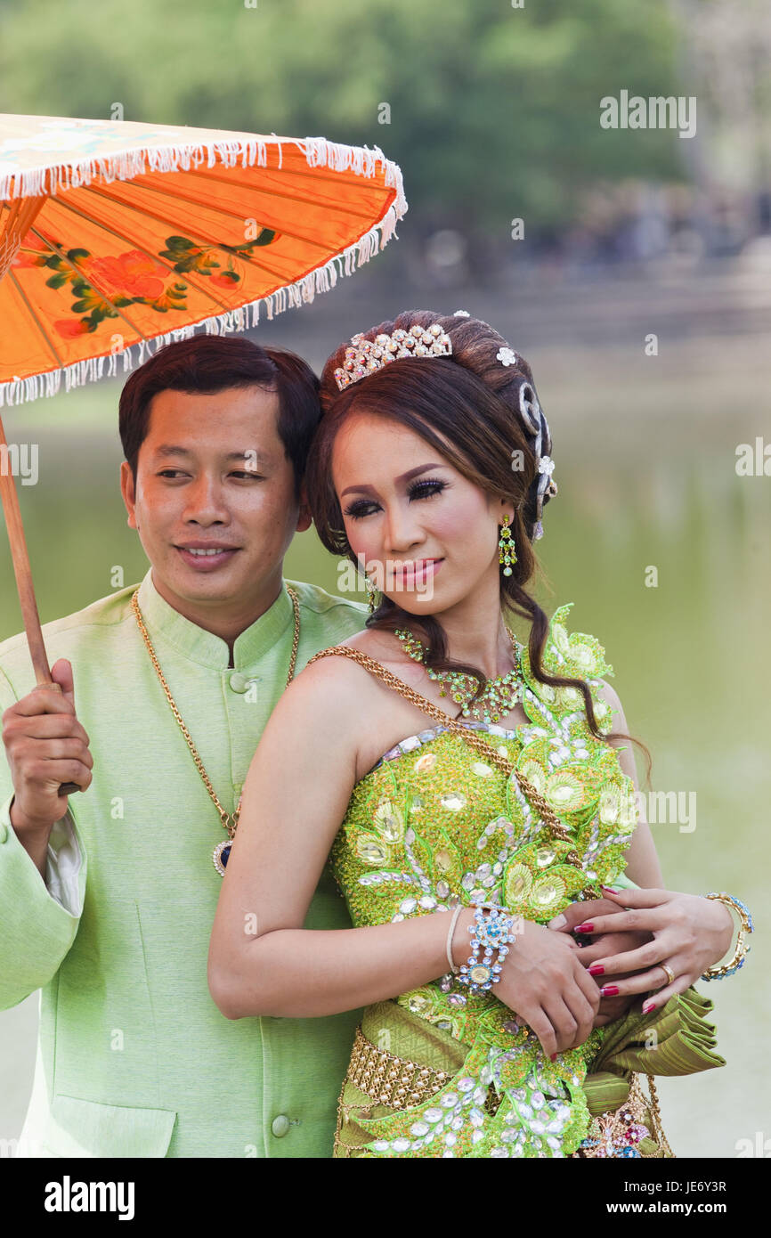 Cambodia, Siem Reap, Angkor Wat, couple in traditional wedding clothes ...