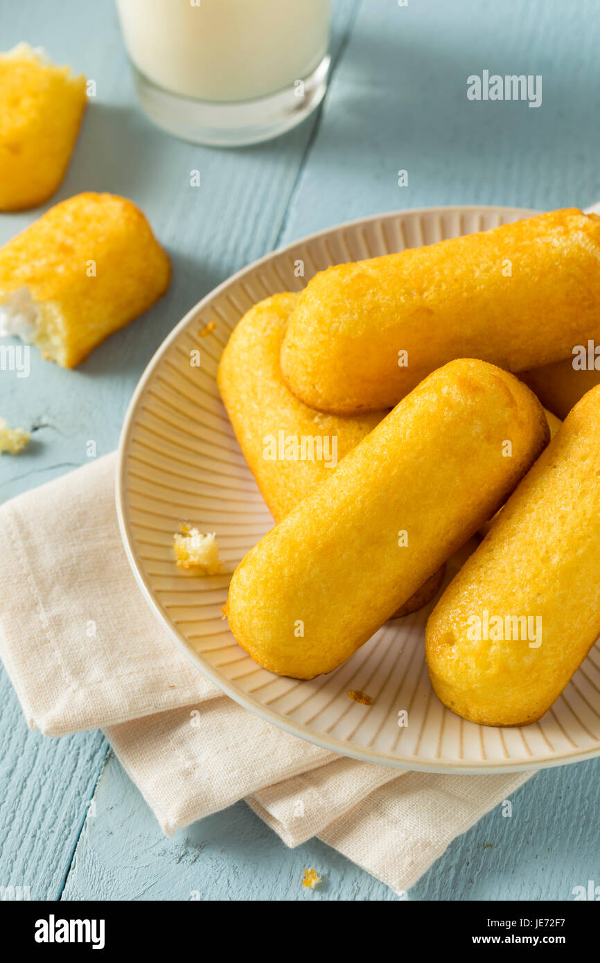 Sweet Yellow Sponge Snack Cake with a Cream Filling Stock Photo - Alamy