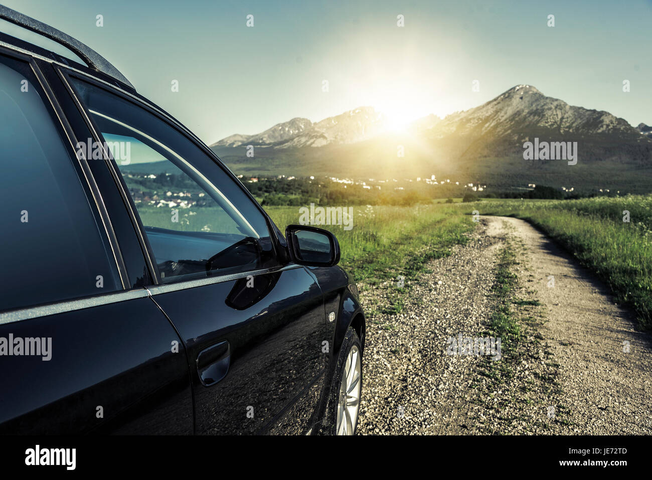 Car is driving on the country road Stock Photo - Alamy