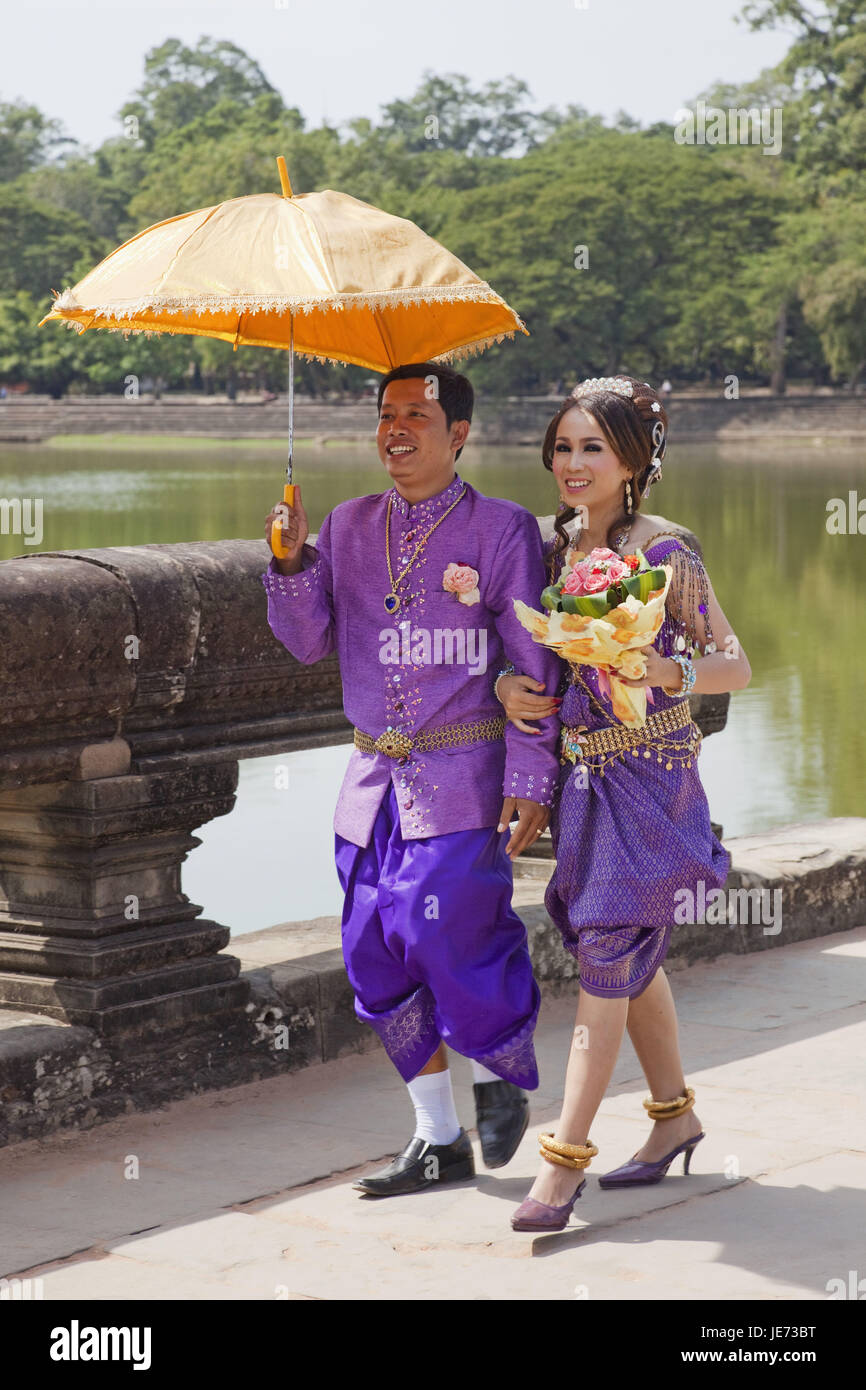 Cambodia, Siem Reap, Angkor Wat, couple in traditional wedding clothes ...