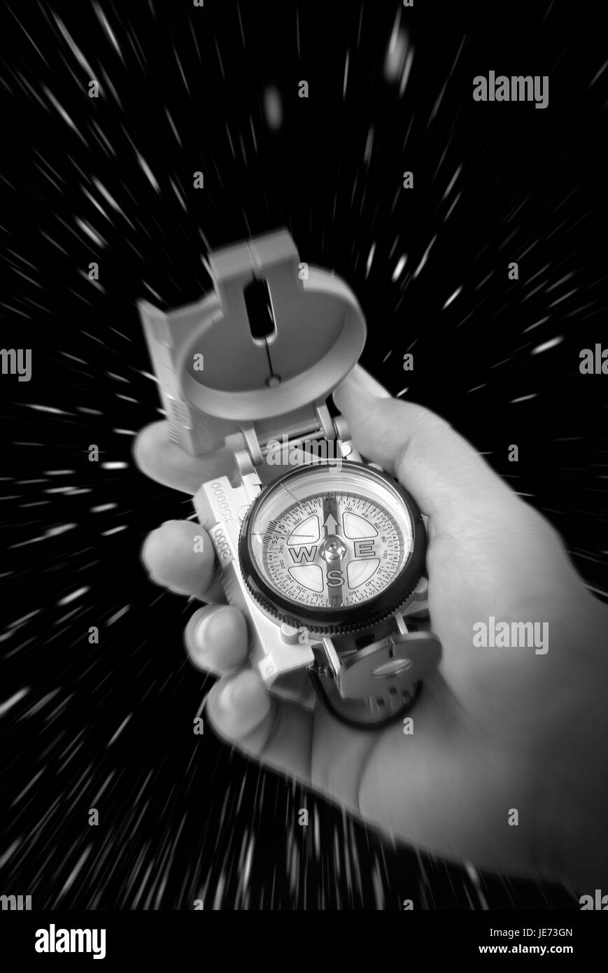 Hand with compass, s/w Stock Photo - Alamy