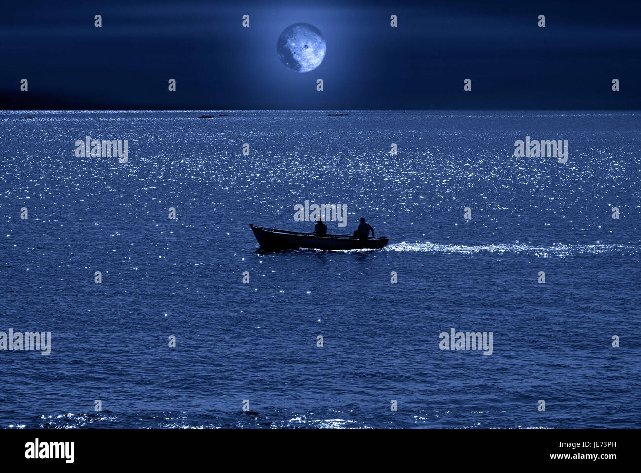 Sea, boat, full moon, at night Stock Photo - Alamy