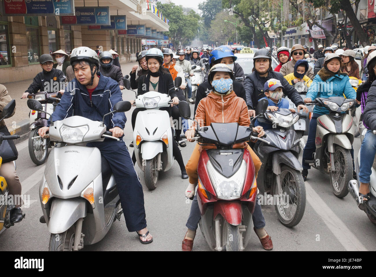 Vietnam, Hanoi, street scene, traffic, motor scooter, motorcyclist ...