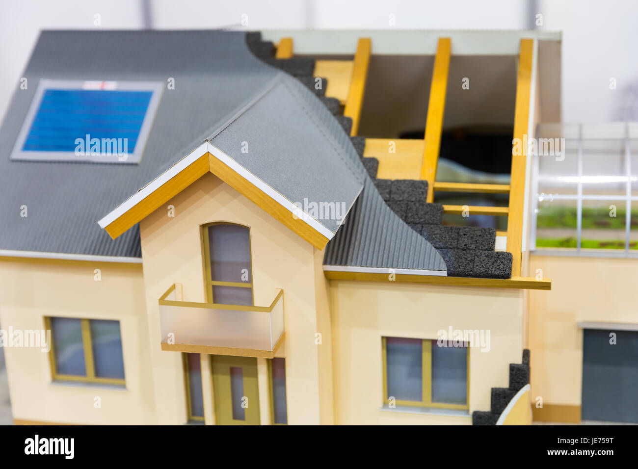 Model of house, thermal insulation of roof concept. Energy and money ...
