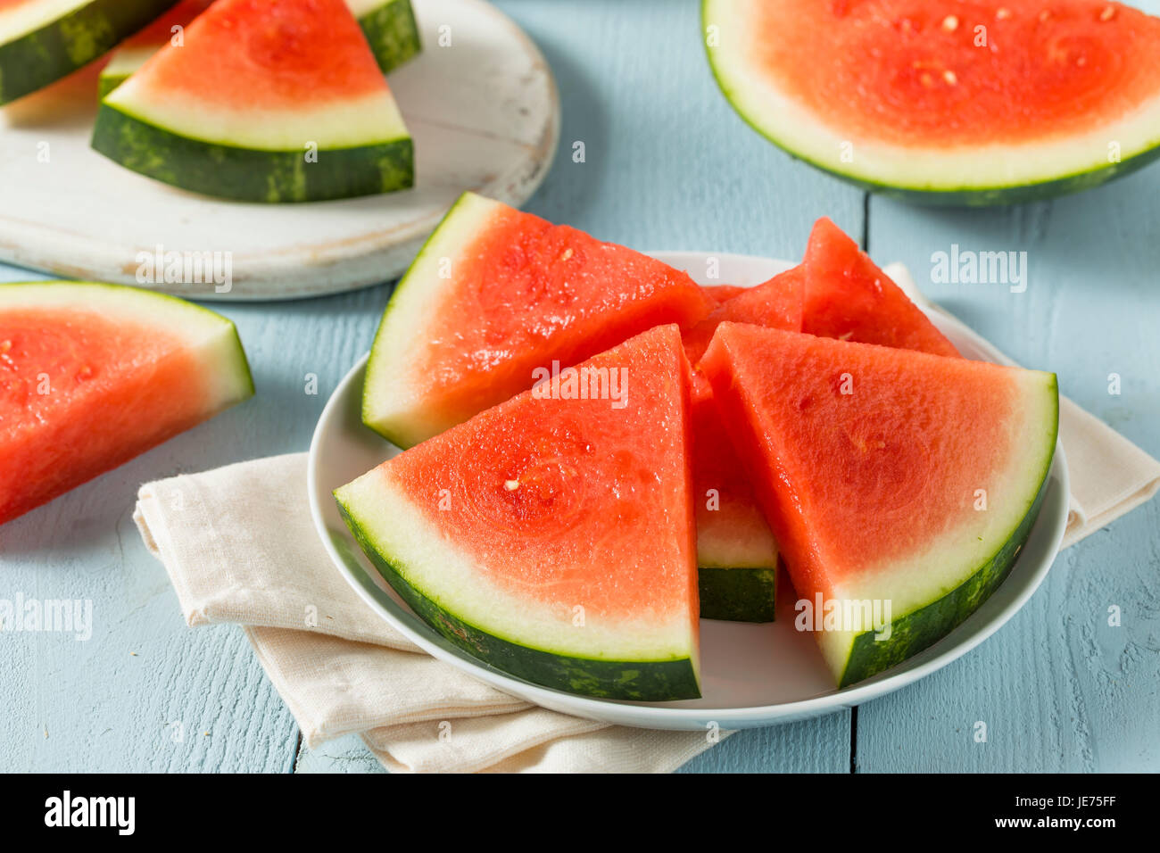 Raw Organic Red and Green Watermelon Cut into Slices Stock Photo - Alamy