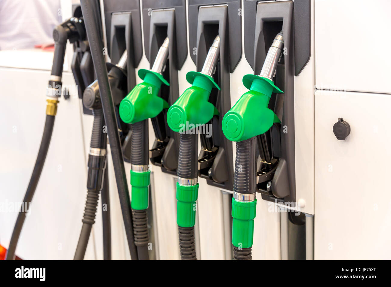 Guns at the gas station closeup, nobody. Car refuel. Unsigned fuel ...