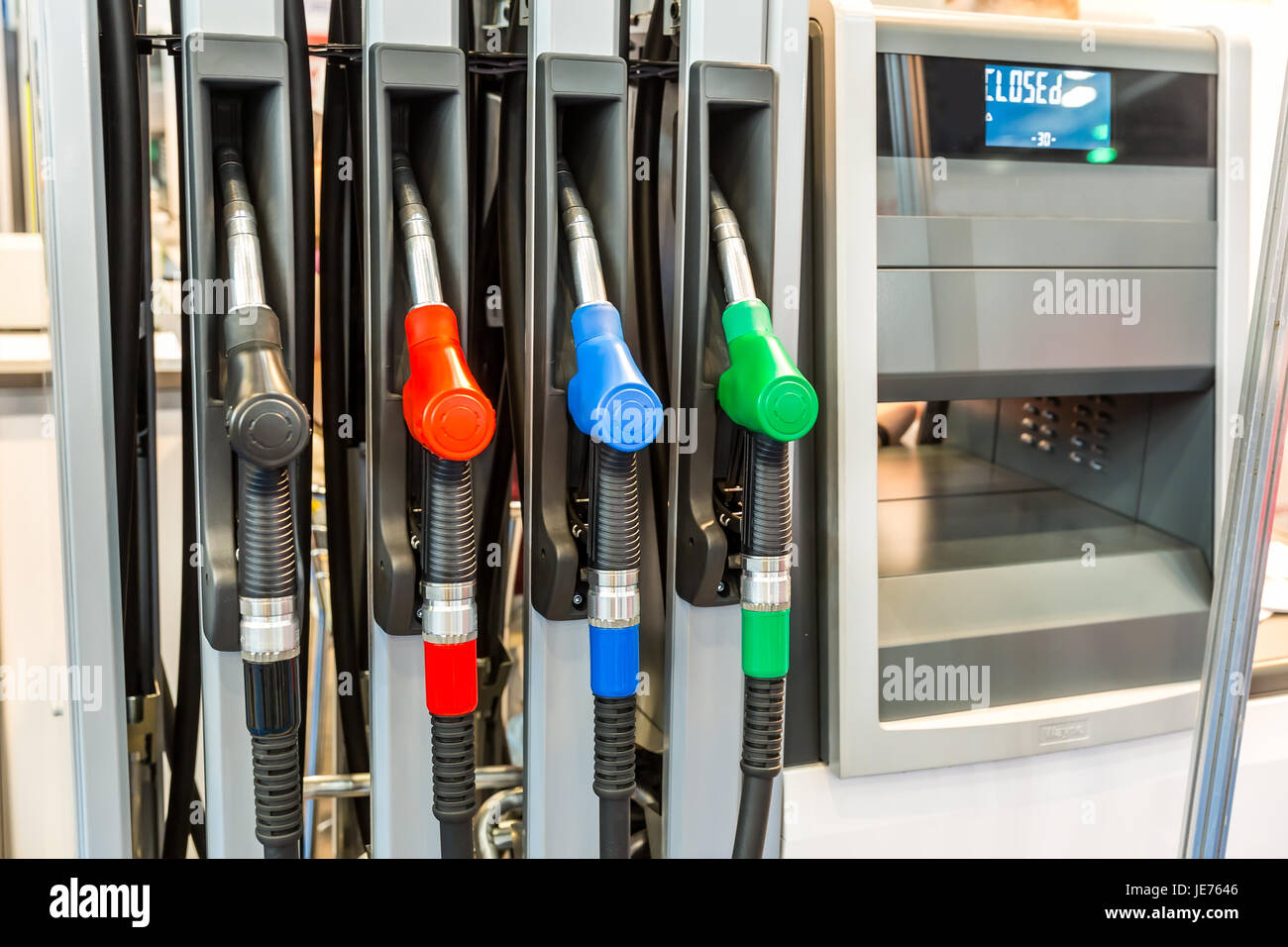 Green color fuel pump gun hi-res stock photography and images - Alamy