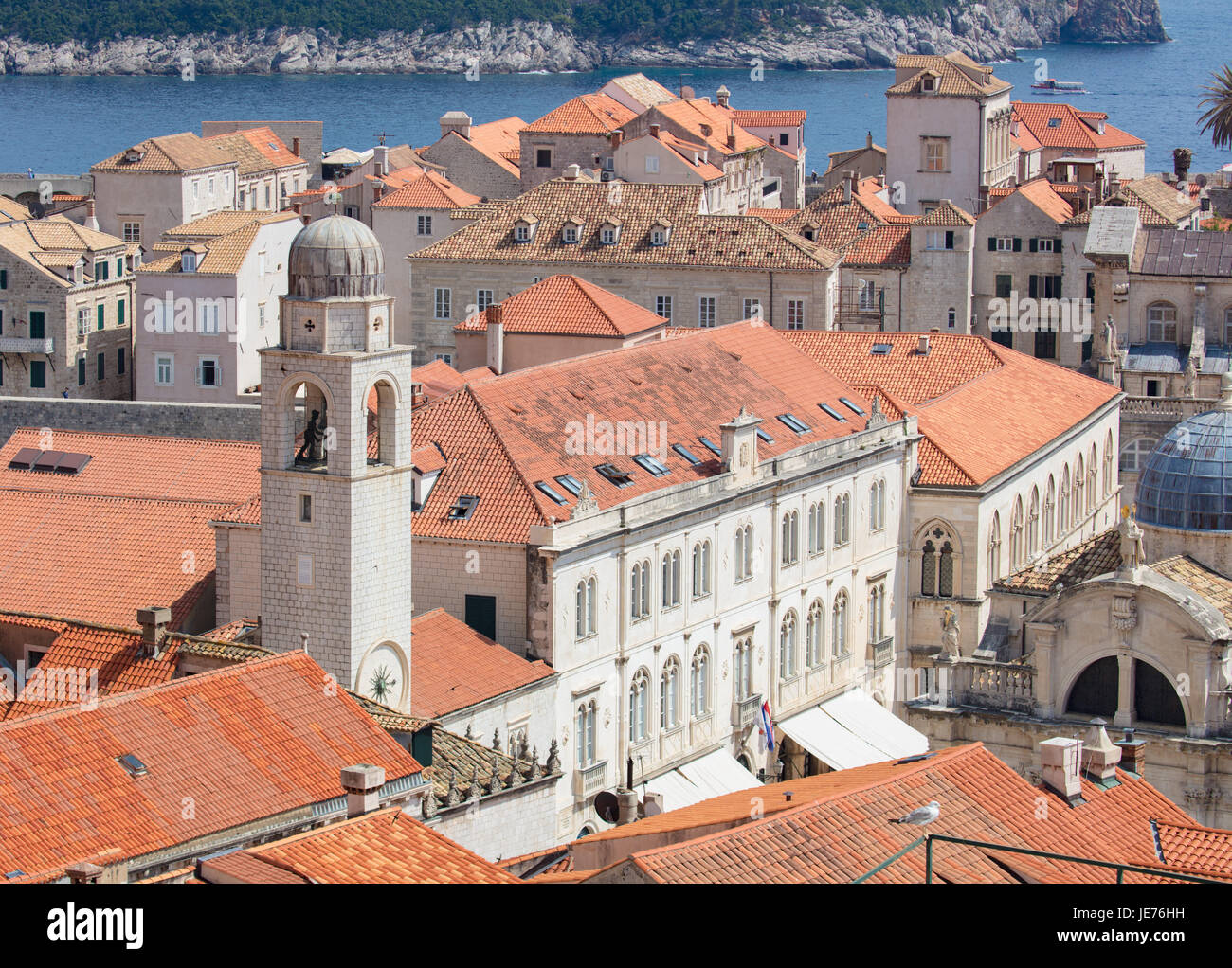 Bell tower sounding the hours over the medieval city of Dubrovnik on ...