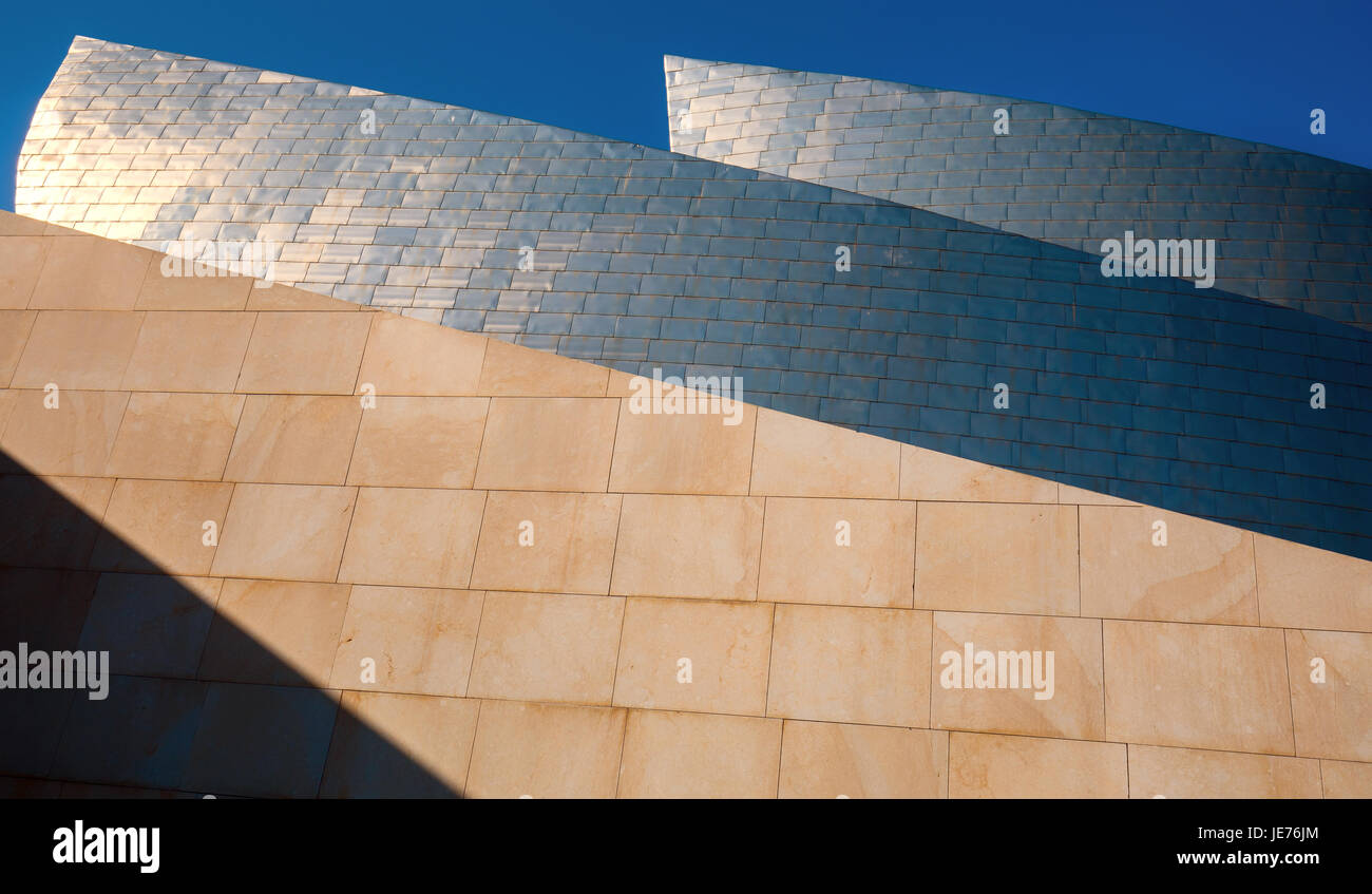 Titanium and limestone facade of the Guggenheim Museum at Bilbao in ...