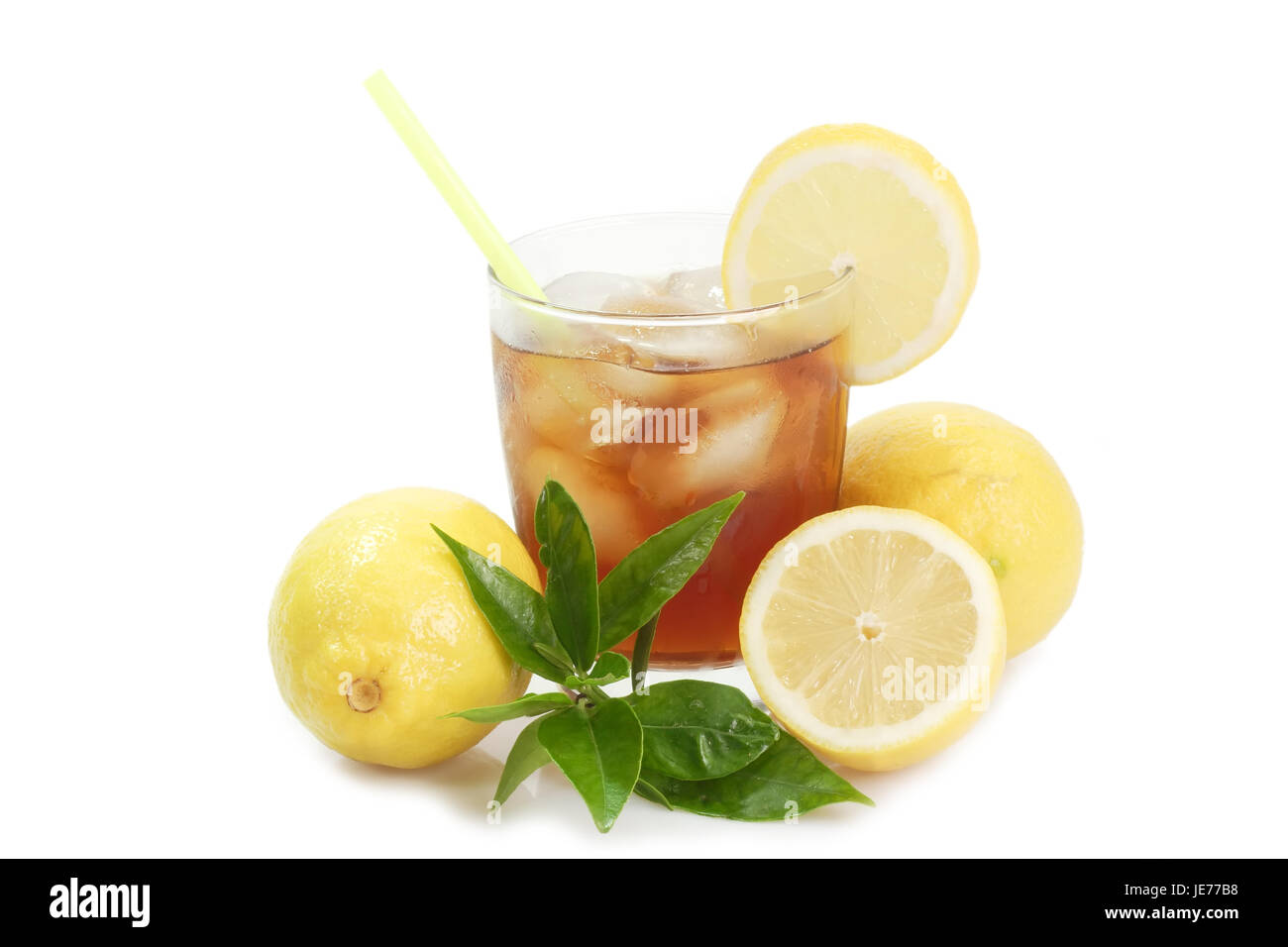 A glass full of Ice Tea with a lemon slice on bright background Stock ...