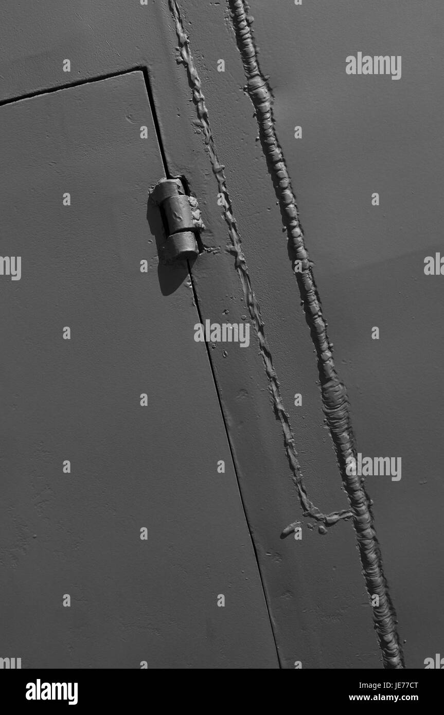 Conception, metal door, black, weld seam Stock Photo - Alamy