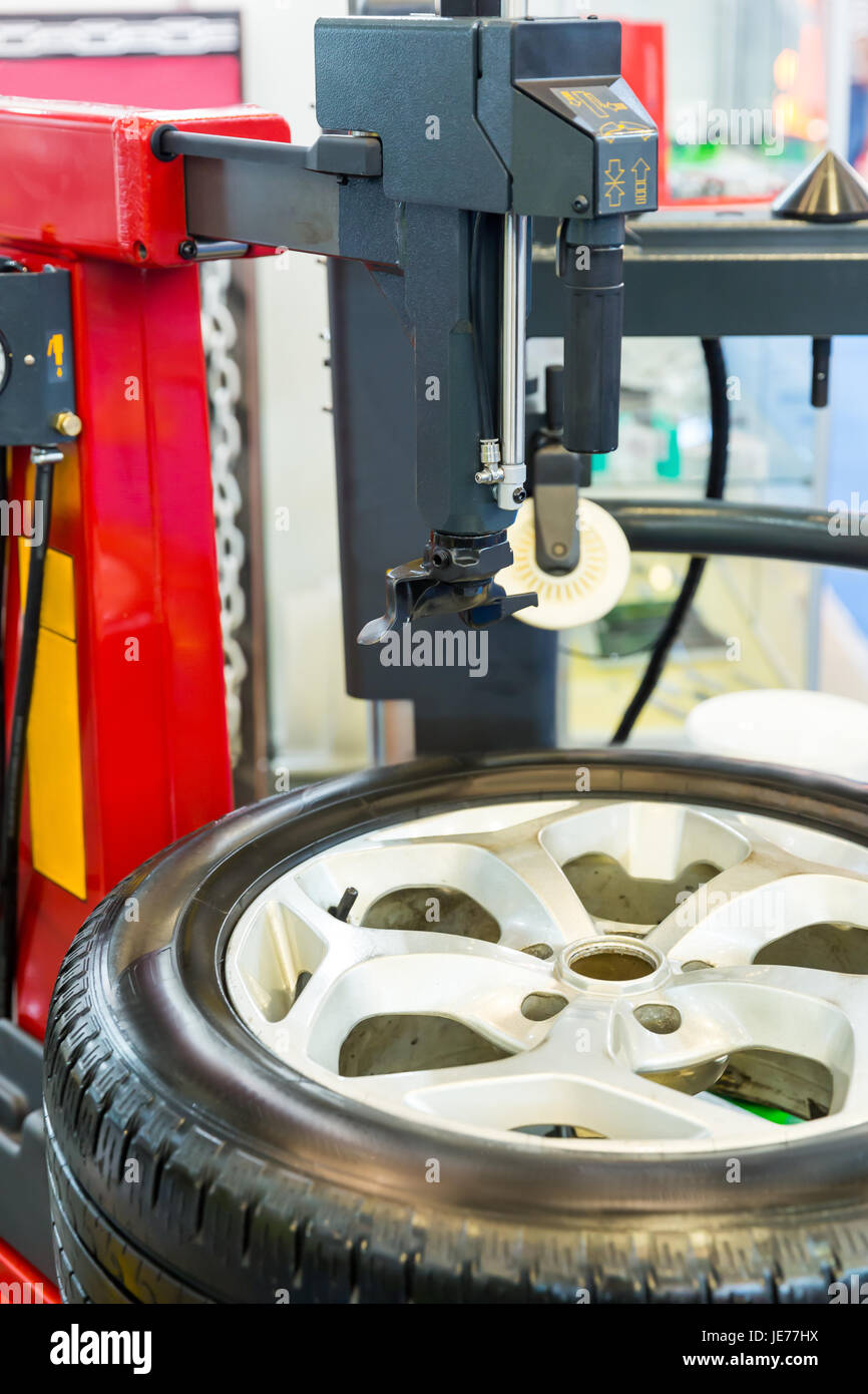 Pneumatic machine for tire service, removing tyre from wheel Stock ...