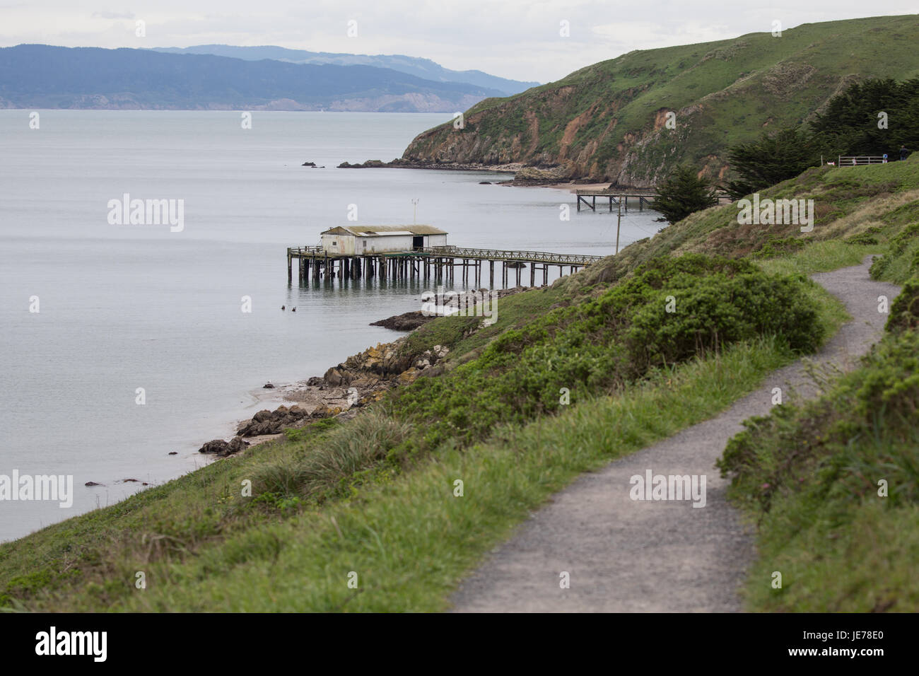 Seaside path ambles down to long ocean piers for the fishing boats ...