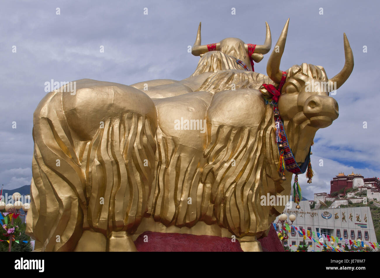 Golden yaks, statue in the centre of Lhasa, Tibet, Asia Stock Photo - Alamy