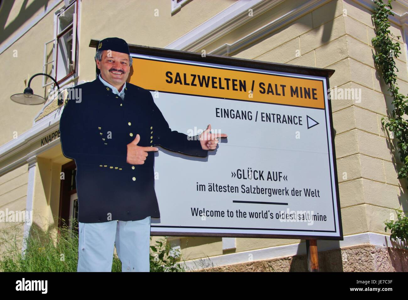 Sign leading to the entrance to the Hallstatt Salt World, a historic ...