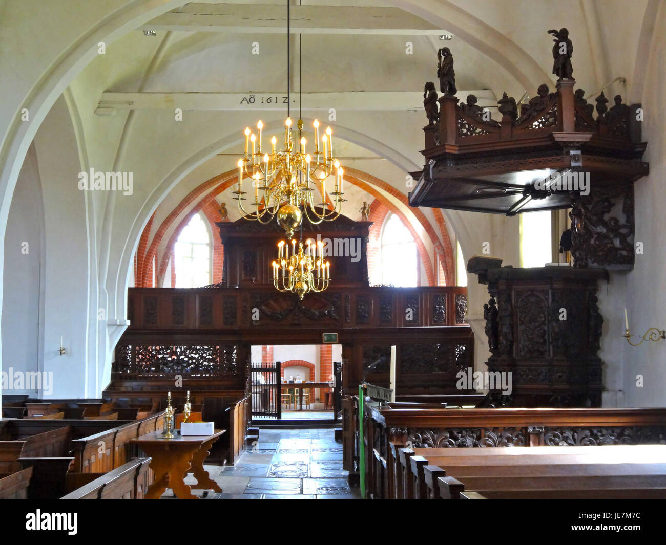 The image depicts the Church of Uithuizen, a historic structure in the ...