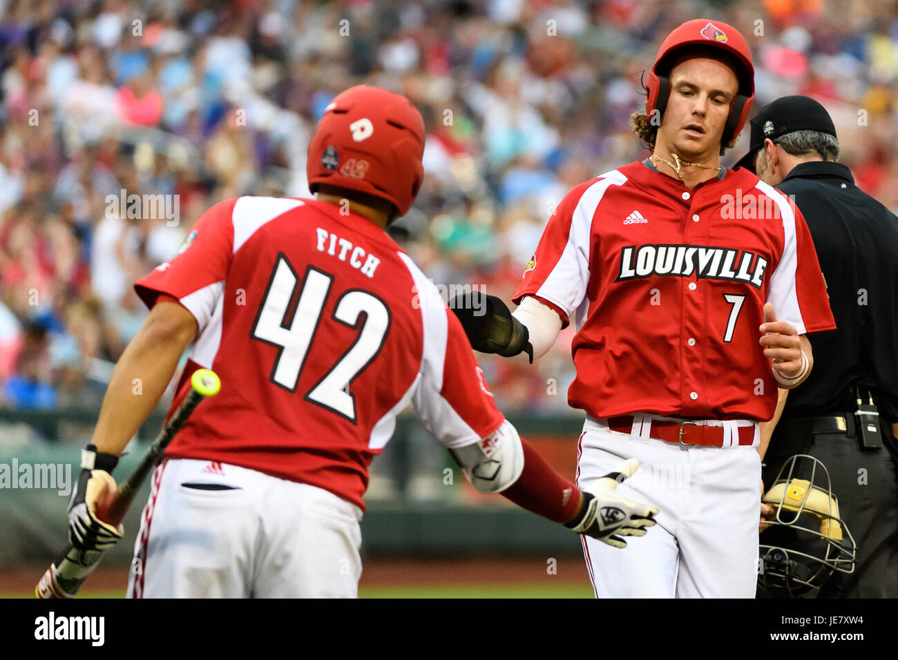 Omaha, NE USA. 22nd June, 2017. Louisville's Devin Mann #7 gets five ...