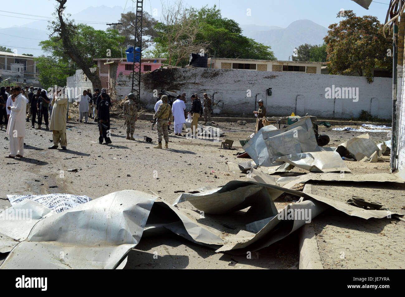 Quetta. 23rd June, 2017. Security officials stand guard at the blast ...