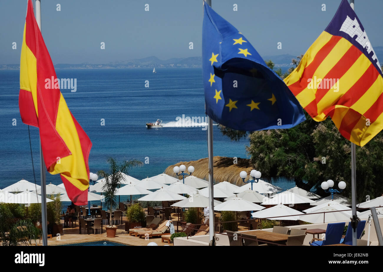 The flags of Spain, the European Union and the Balearic Islands on a ...