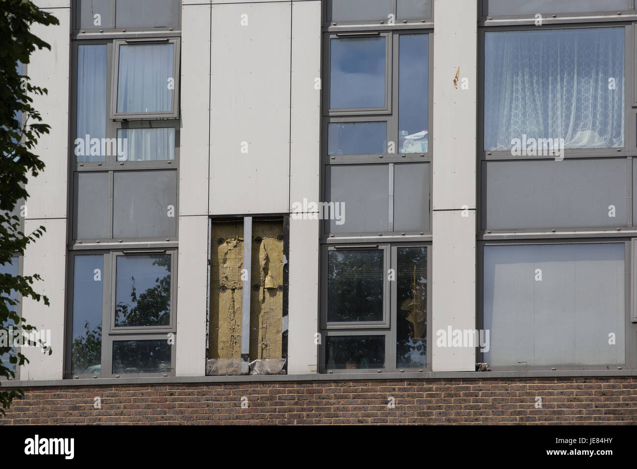 London, UK. 23rd June, 2017. A cladding panel is removed for testing at ...