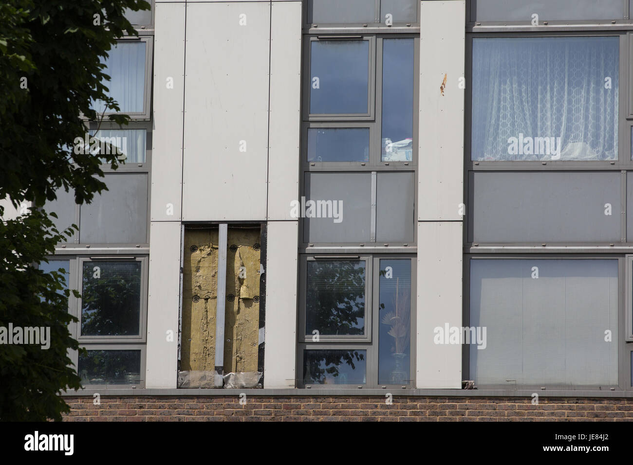 London, UK. 23rd June, 2017. A cladding panel is removed for testing at ...