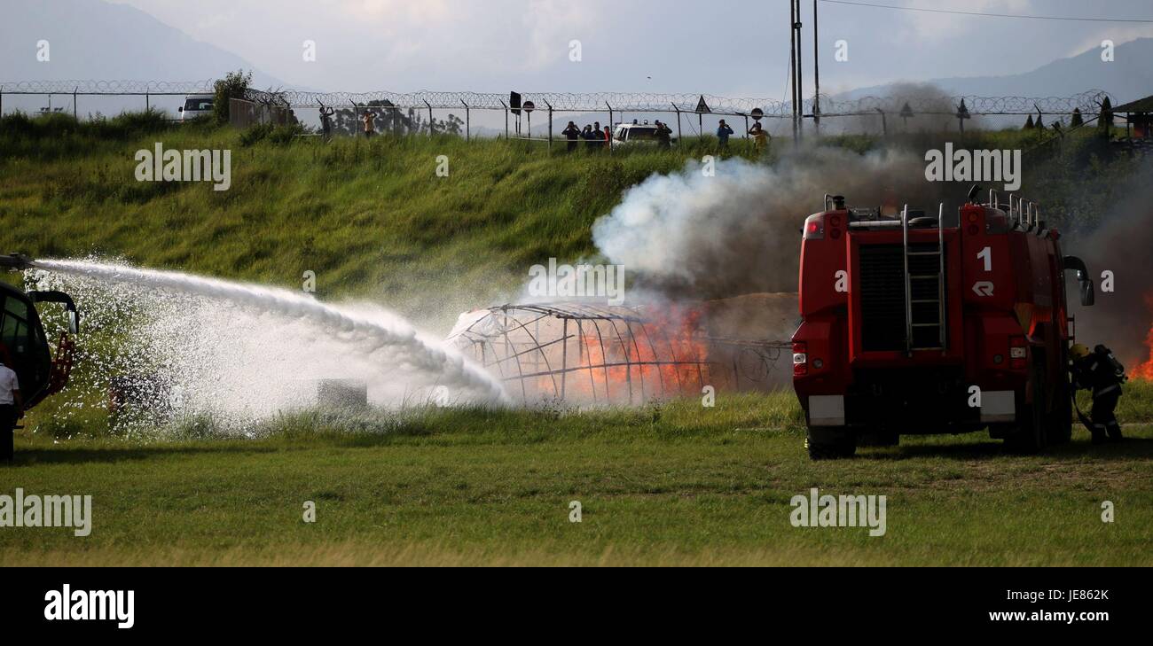 Kathmandu, Nepal. 23rd June, 2017. Nepali firefighters extinguish fire ...