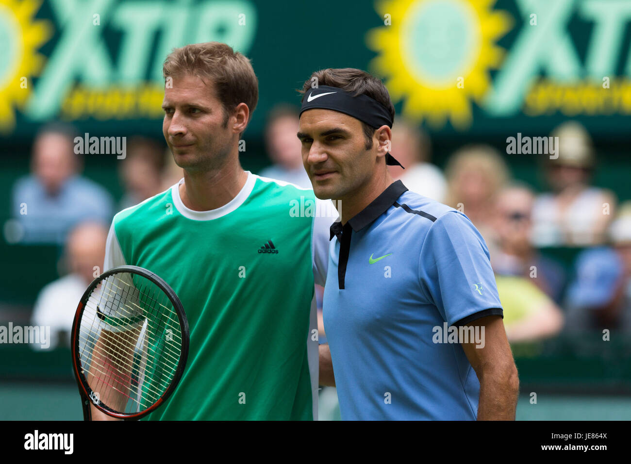Roger Federer of Switzerland and Florian Mayer of Germany before their ...