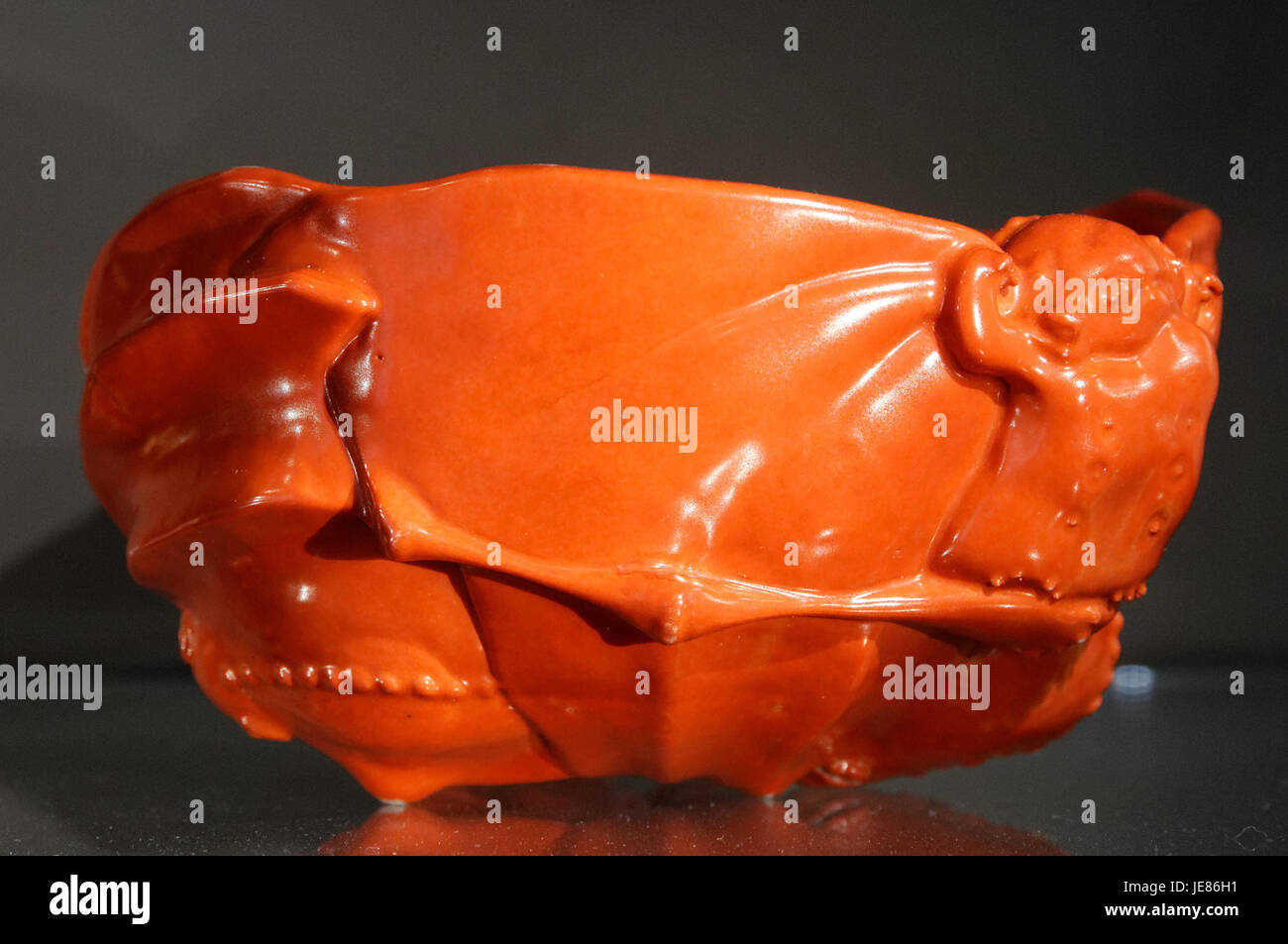 This image depicts a bowl featuring bat motifs, likely part of an ...