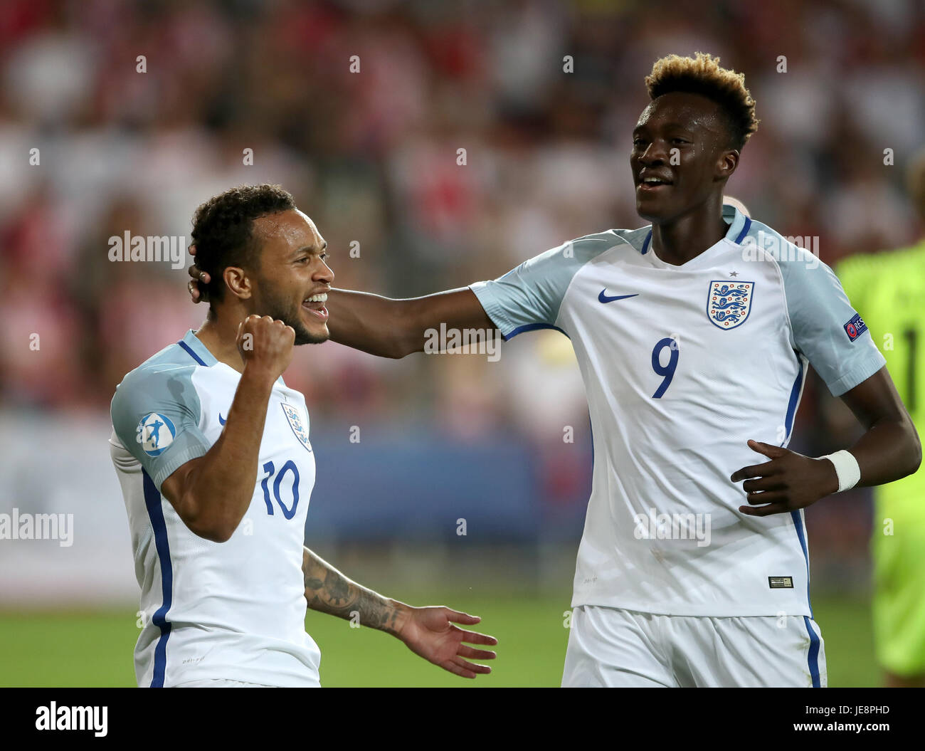 England's Lewis Baker (left) celebrates scoring his side's third goal ...