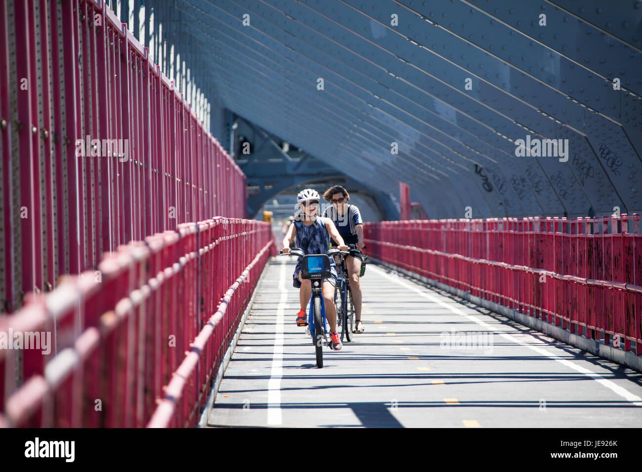 Asian riding bike hi-res stock photography and images - Alamy